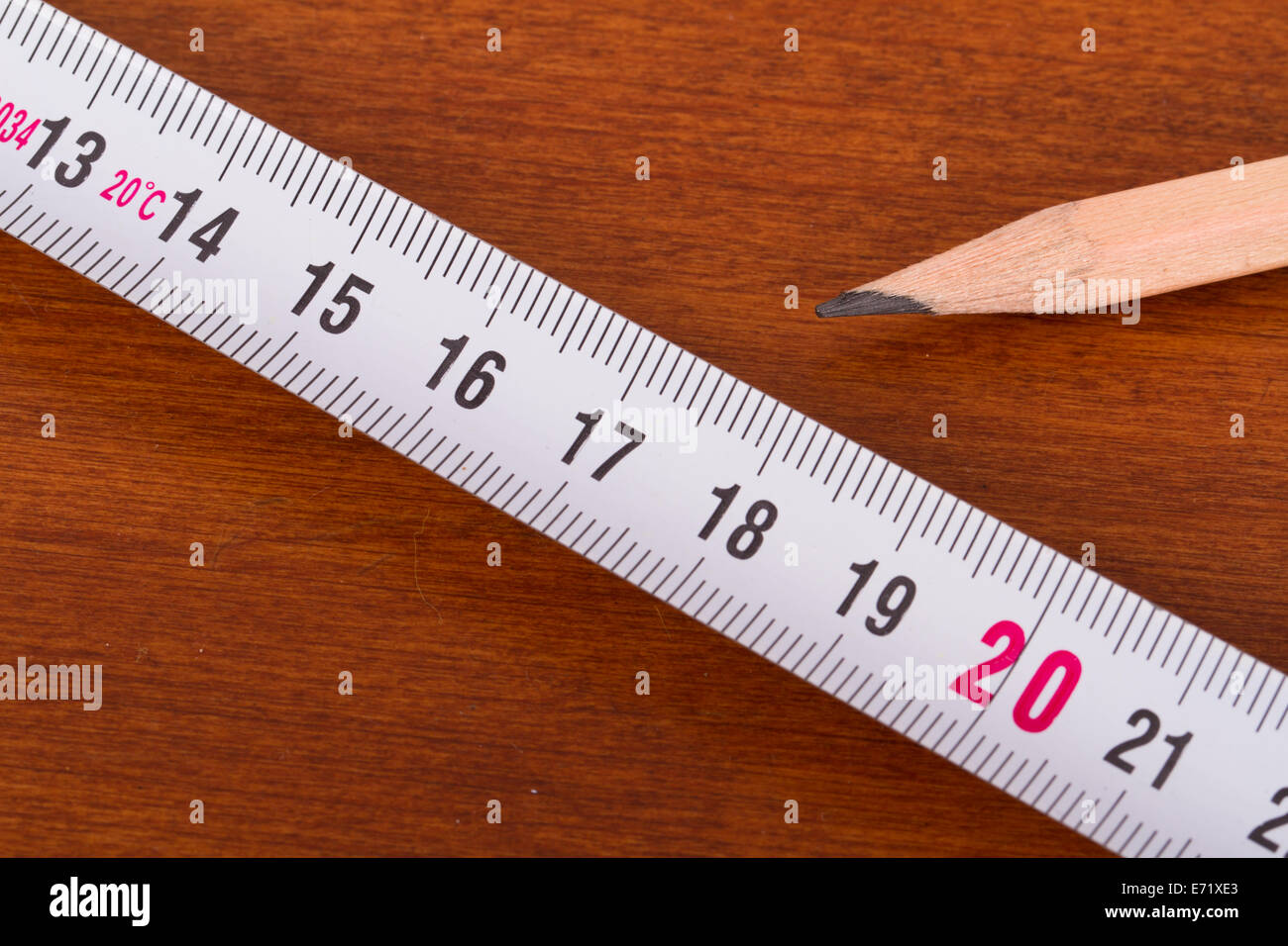 Top view of wood pencil and steel ruler for engineering drawing on ...