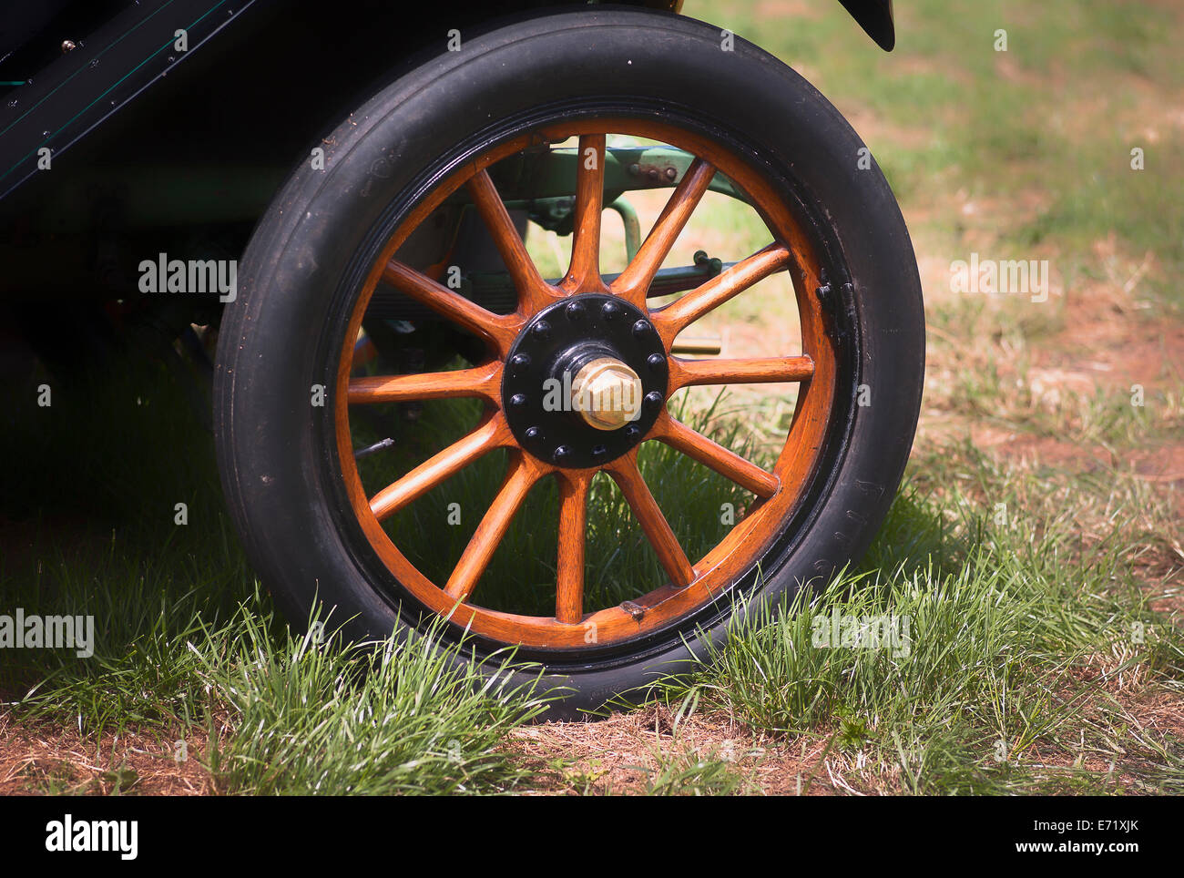 Wooden car wheel dating from early 20th century Stock Photo - Alamy