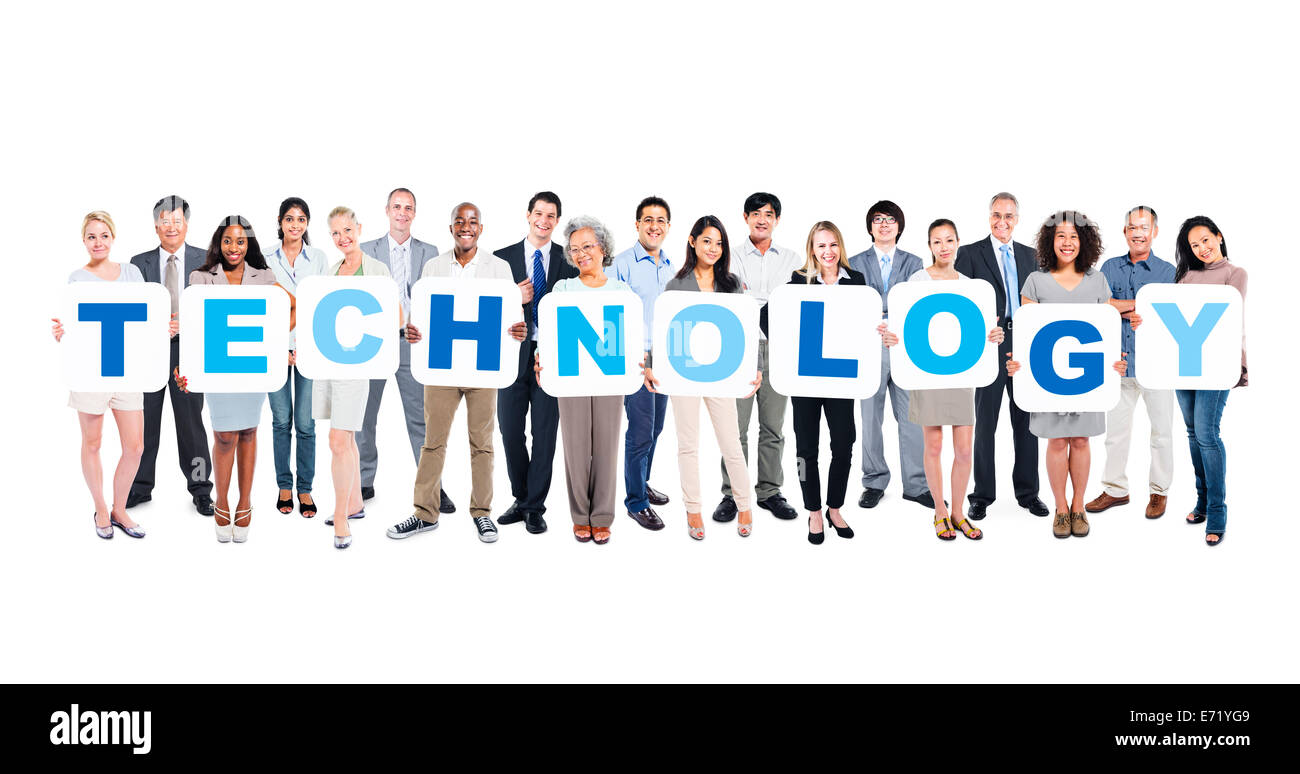 Group Of Business People Holding The Word Technology Stock Photo - Alamy