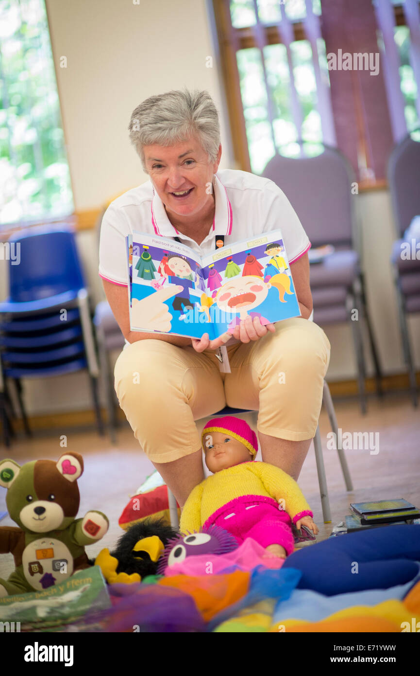 Nursery school children reading book hi-res stock photography and ...