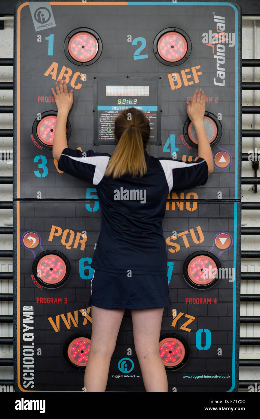 Secondary education Wales UK - girl school pupil in a gymnasium using ...