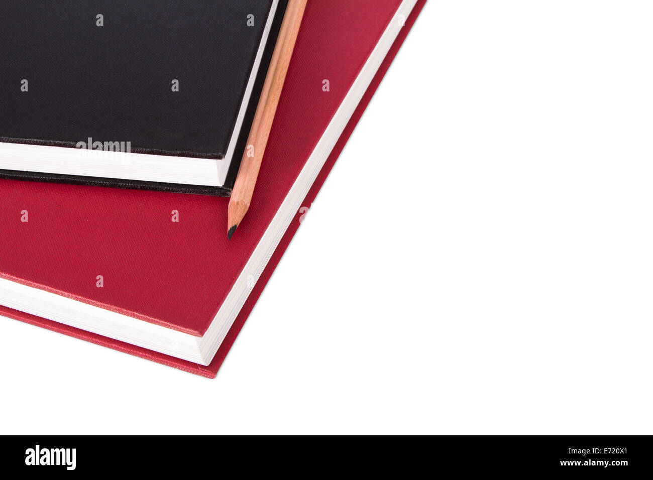 Stack of black and red books with pencil, isolated on white background ...