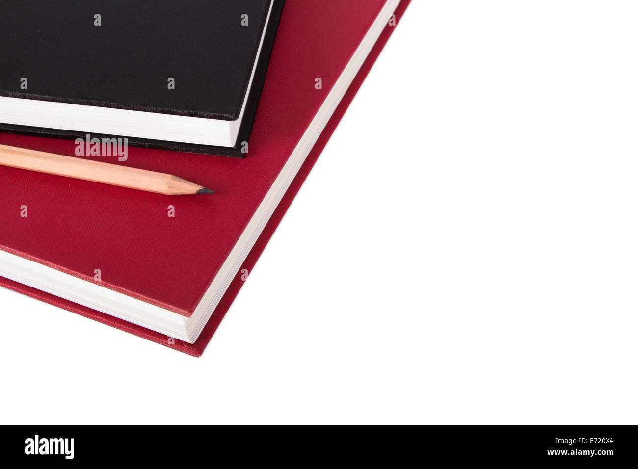 Stack of black and red books with pencil, isolated on white background ...