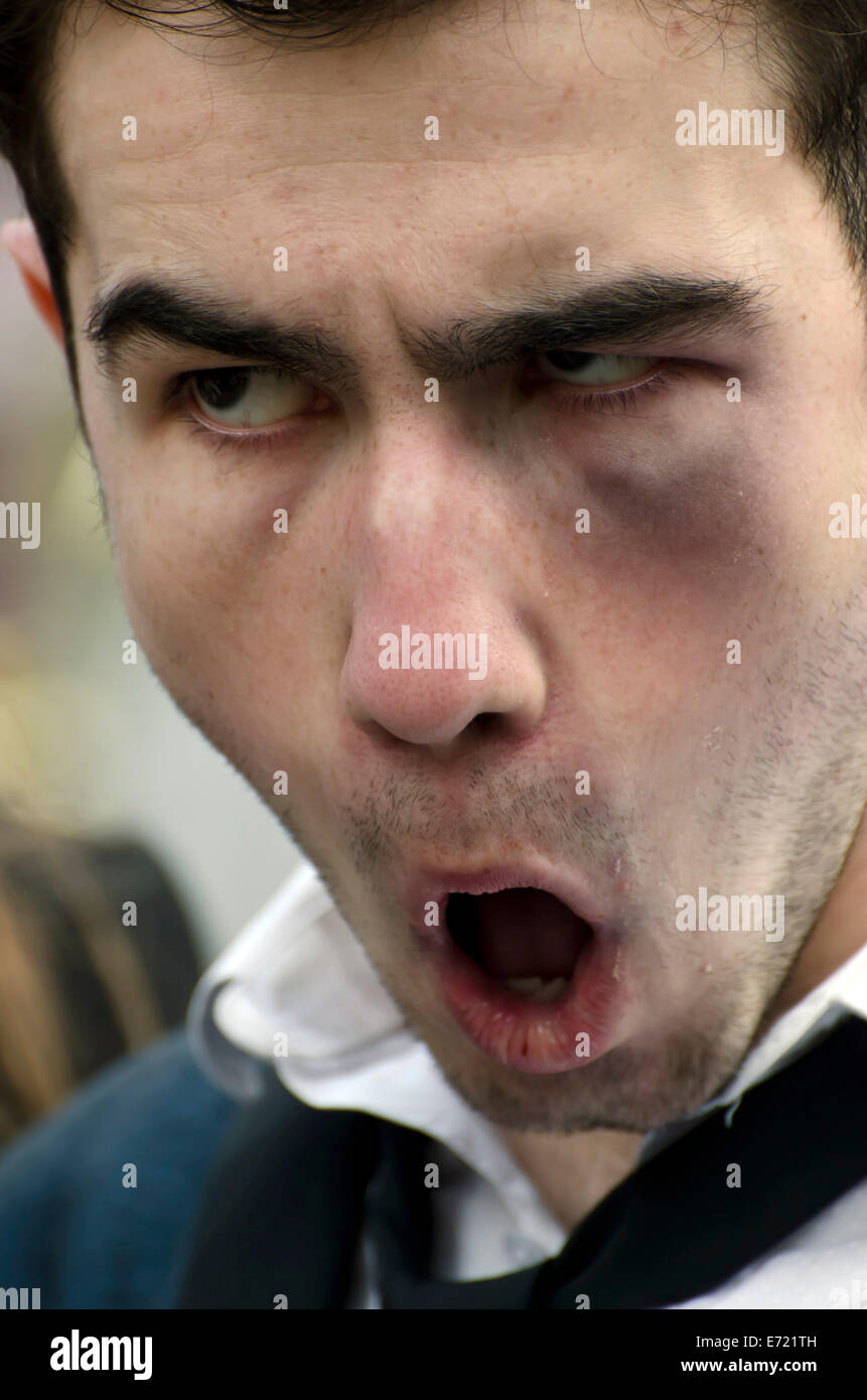 Man with a strange, scary expression promoting a show at the annual ...