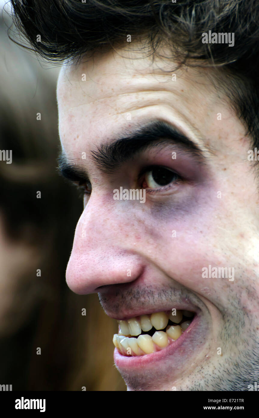 Man with strange expression promoting a show at the annual Festival ...