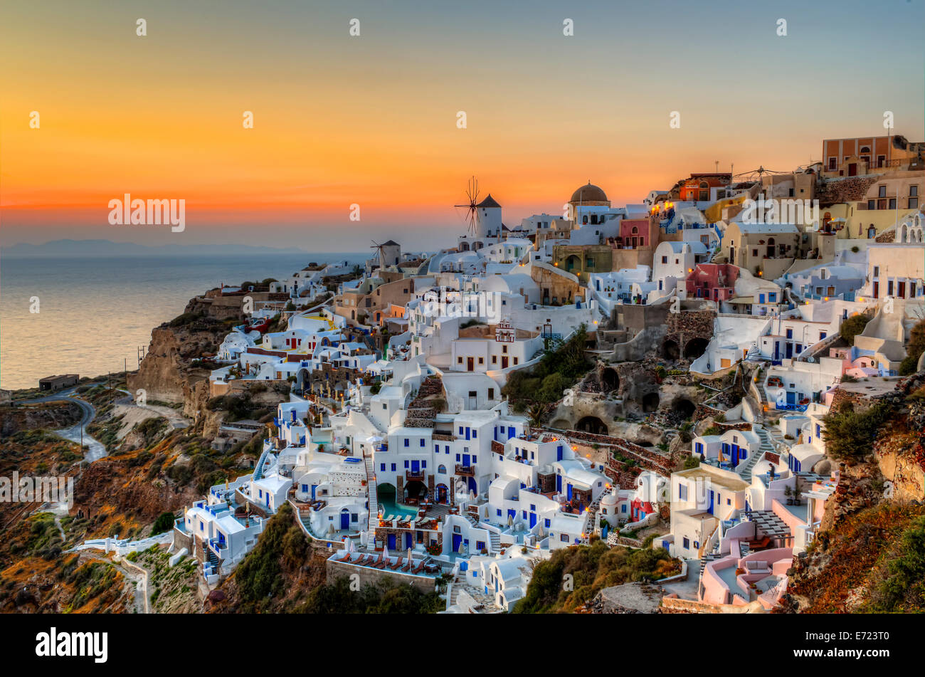 Oia Santorini colorful sunset Stock Photo - Alamy