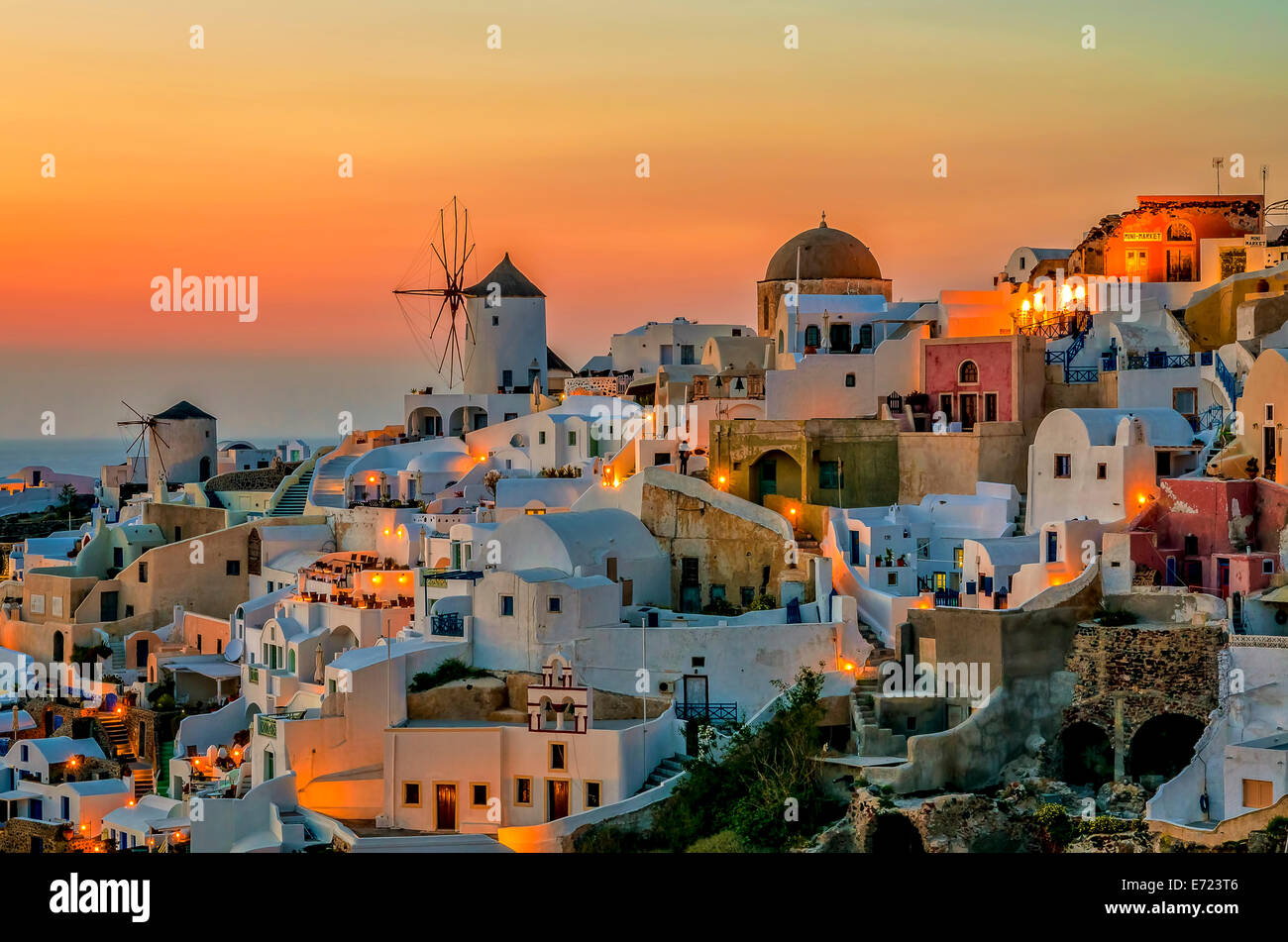 Oia Santorini colorful sunset Stock Photo - Alamy
