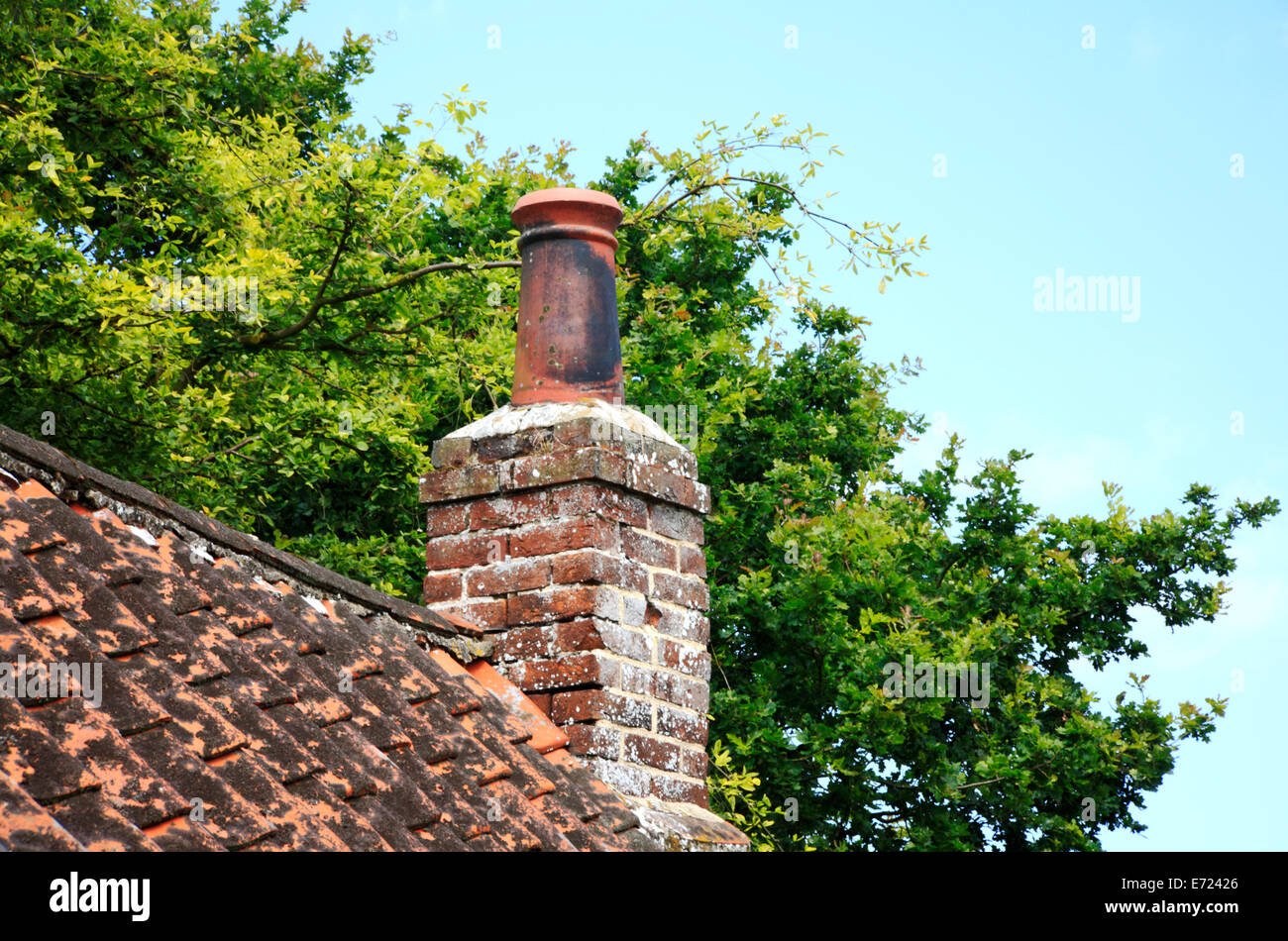 An old brick chimney stack and pot on an outbuilding by Stubb Drainage ...