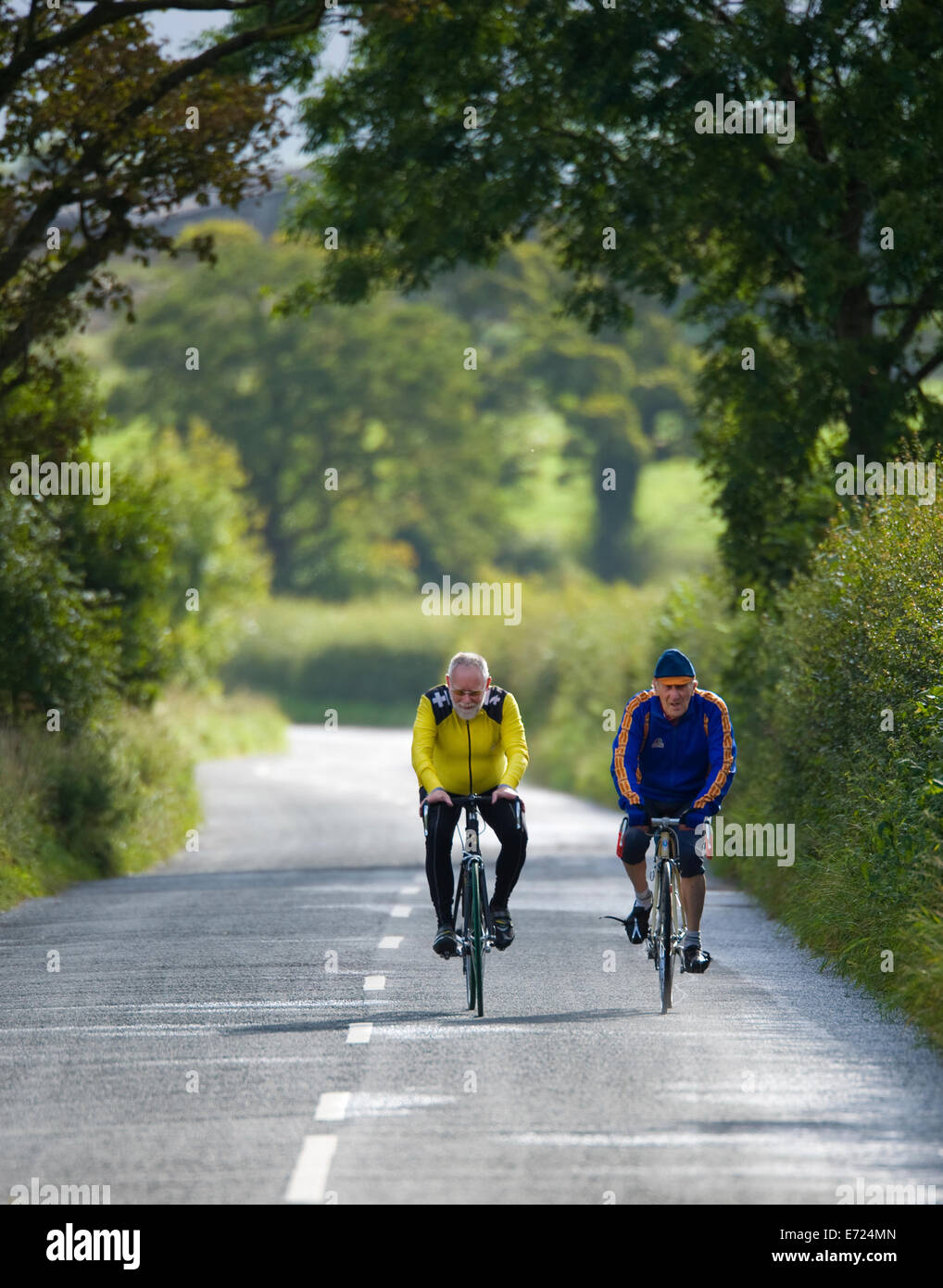 Two cyclists out for a leisurely ride Stock Photo - Alamy