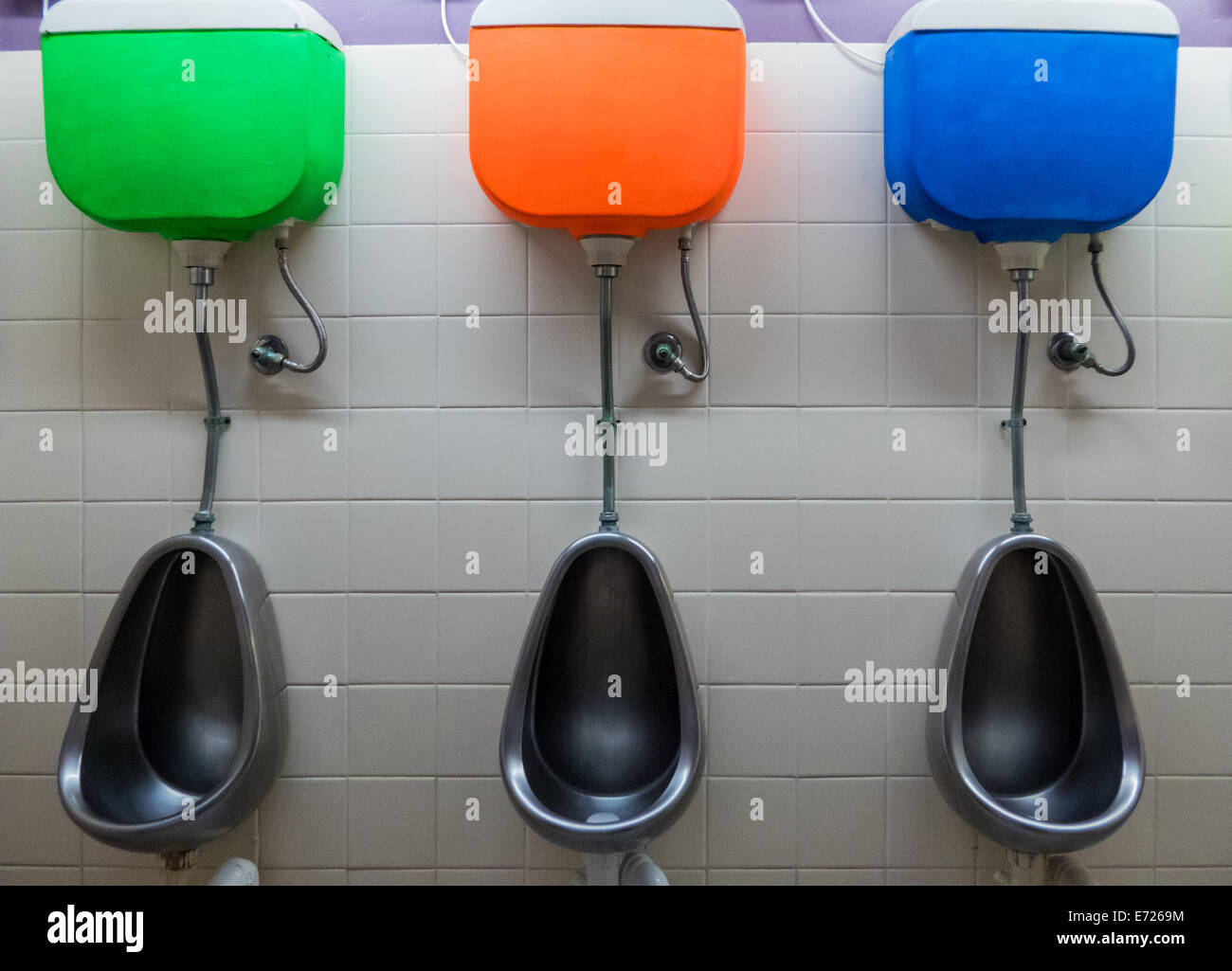 Three urinals hi-res stock photography and images - Alamy