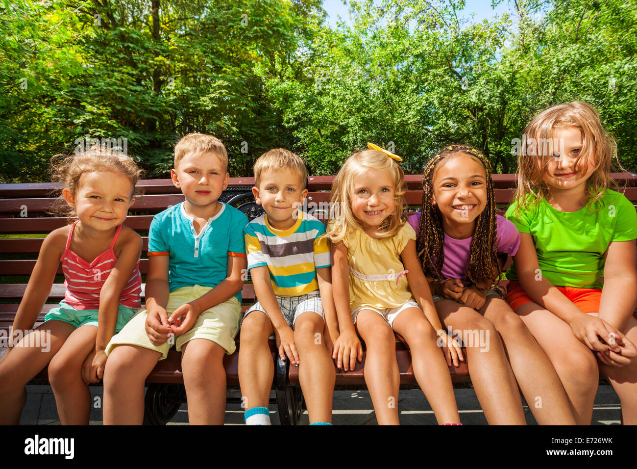 Children on the bench hi-res stock photography and images - Alamy