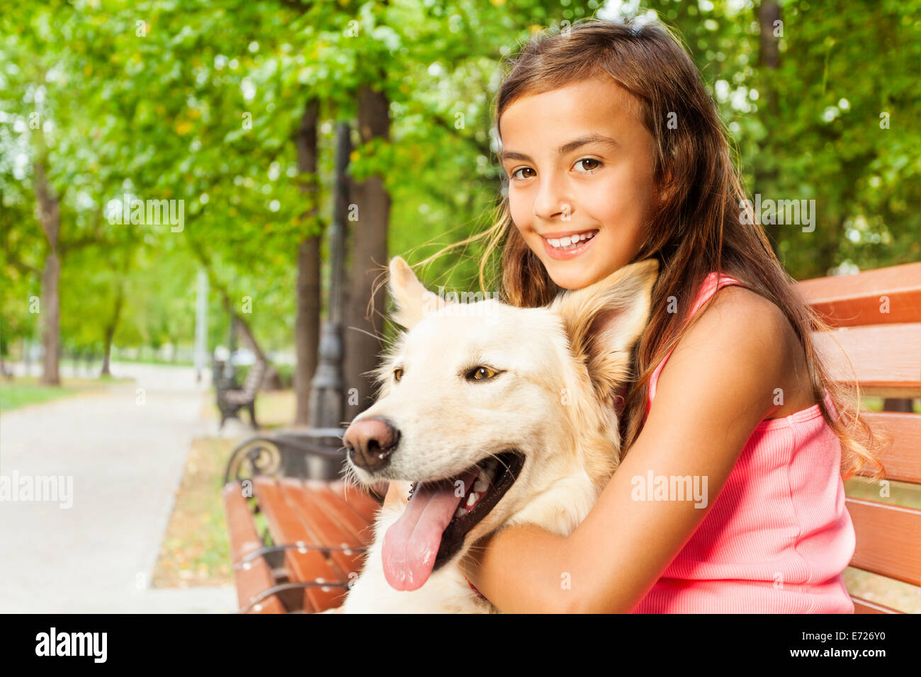 Closeup shoot of girl with her dog Stock Photo - Alamy