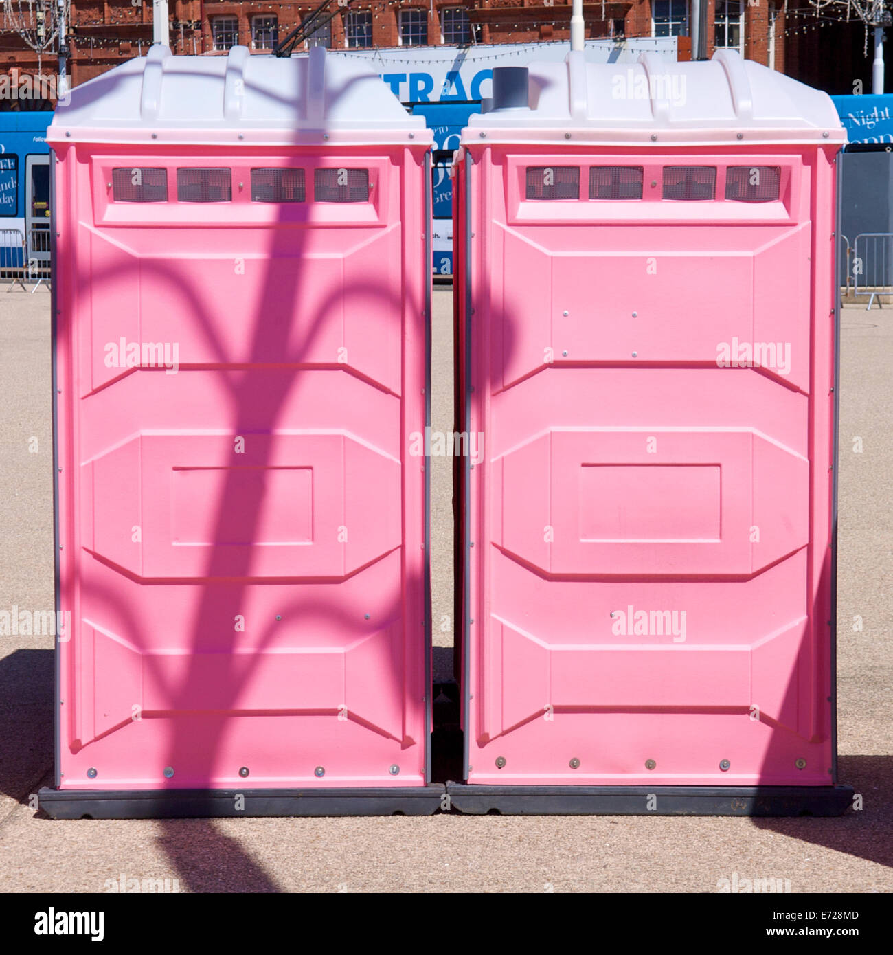 Pink portable toilets Stock Photo - Alamy