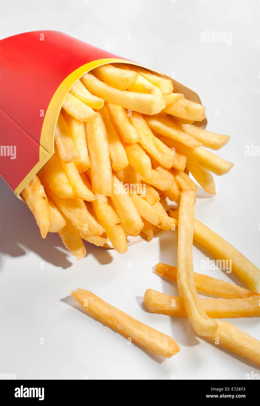french fries in red pack Stock Photo - Alamy