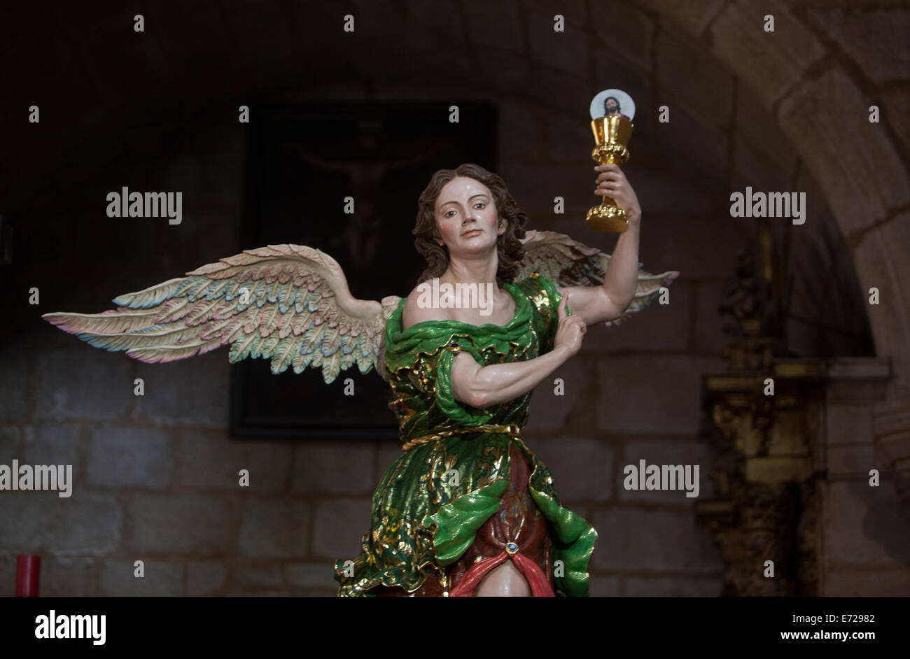 An image of a calyx filled with an ostia with the image of Jesus Christ ...