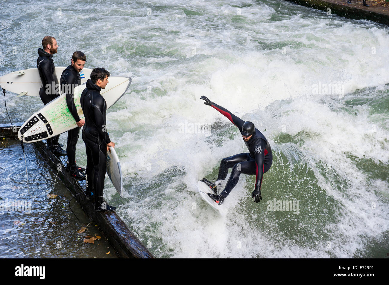 Surfers, Eisbach wave on the Isar, Englischer Garten, Munich, Upper ...