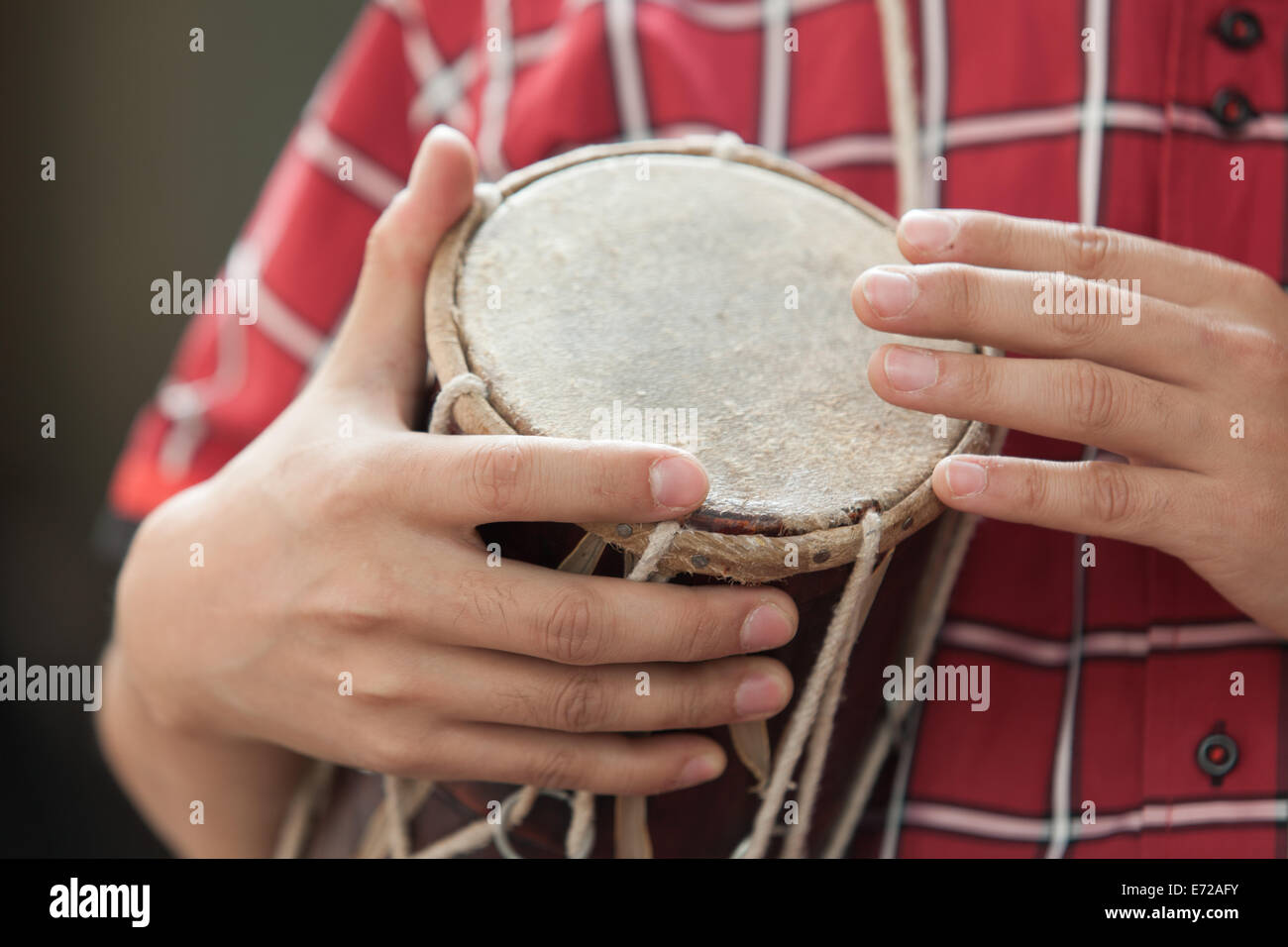 Men's hands beat the drum Stock Photo - Alamy