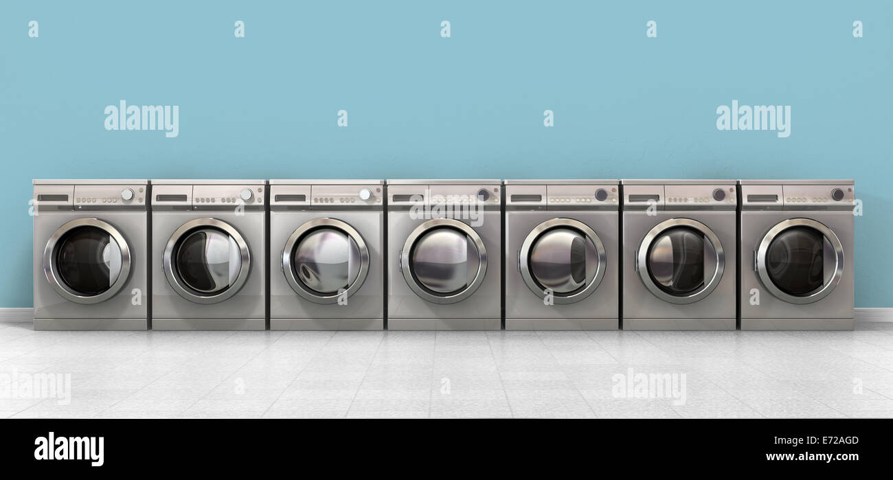 A front view of a row of empty regular brushed metal washing machines ...