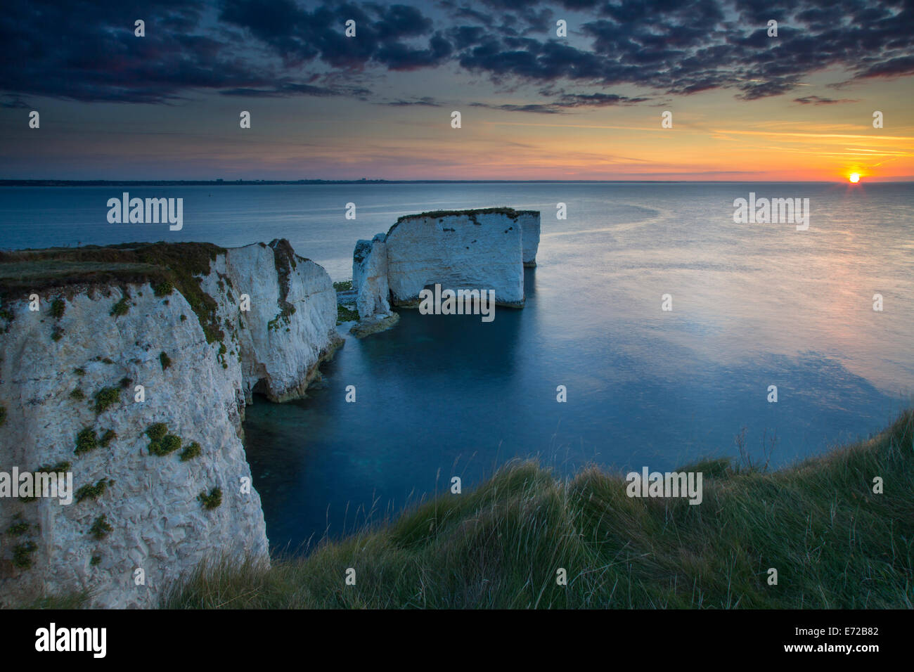 Sunrise over The white cliffs and Harry Rocks at Studland, Isle of ...