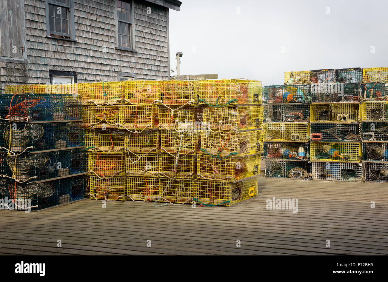 Lobster traps on a pier in Bass Harbor Maine Stock Photo - Alamy