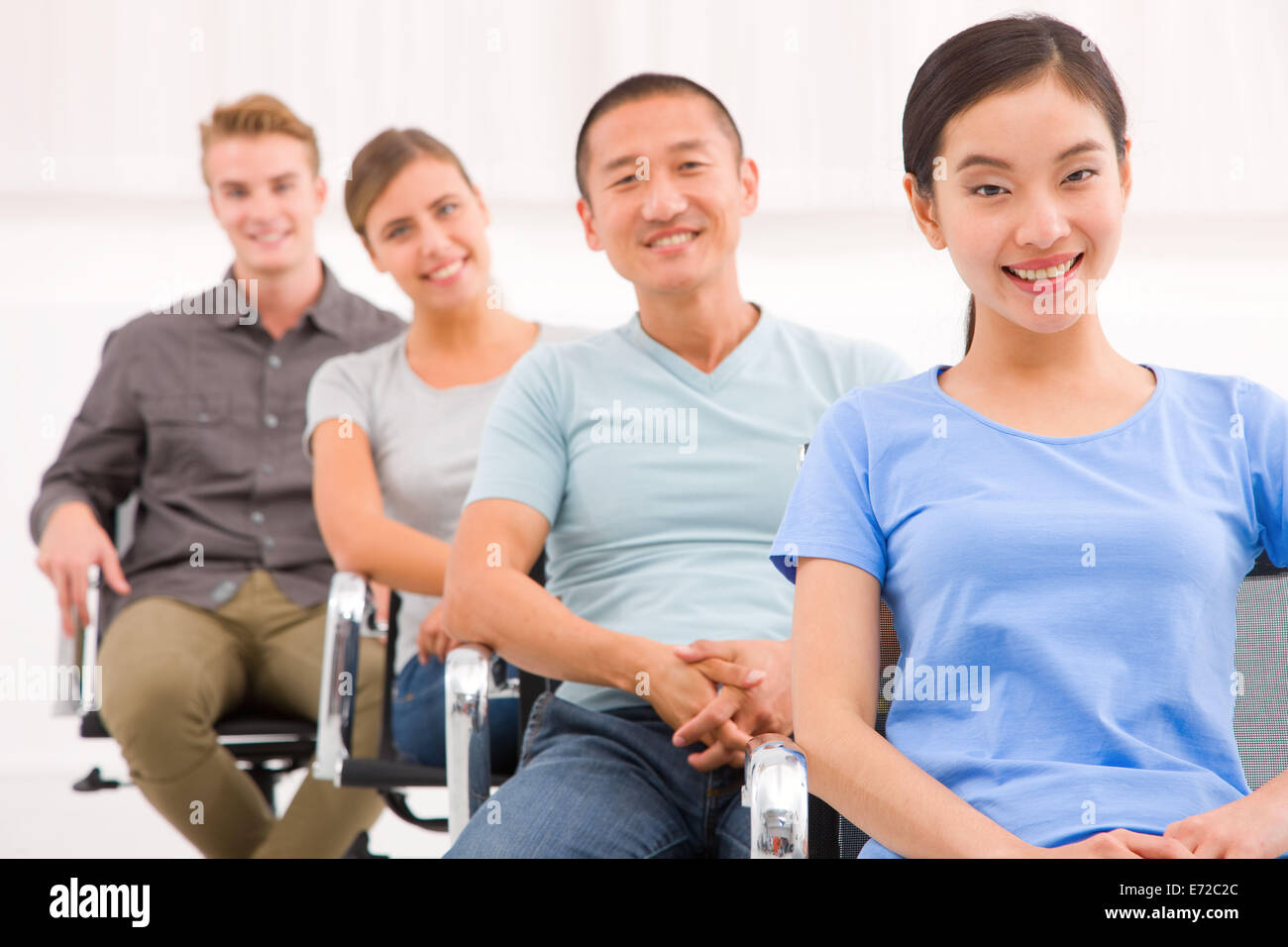 Group businesspeople sitting in hi-res stock photography and images - Alamy