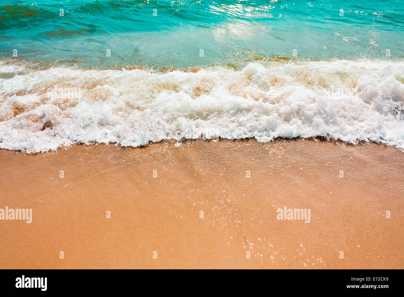 Soft Sea Ocean Waves Wash Over Golden Sand Background Stock Photo - Alamy