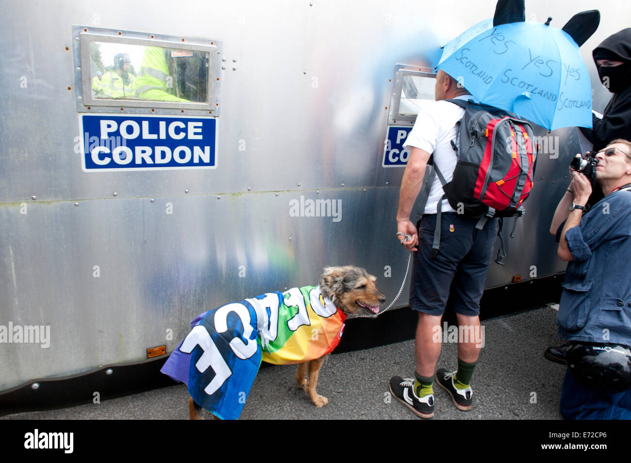 Newport, UK. 4th September 2014. Protesters try to force entry through ...