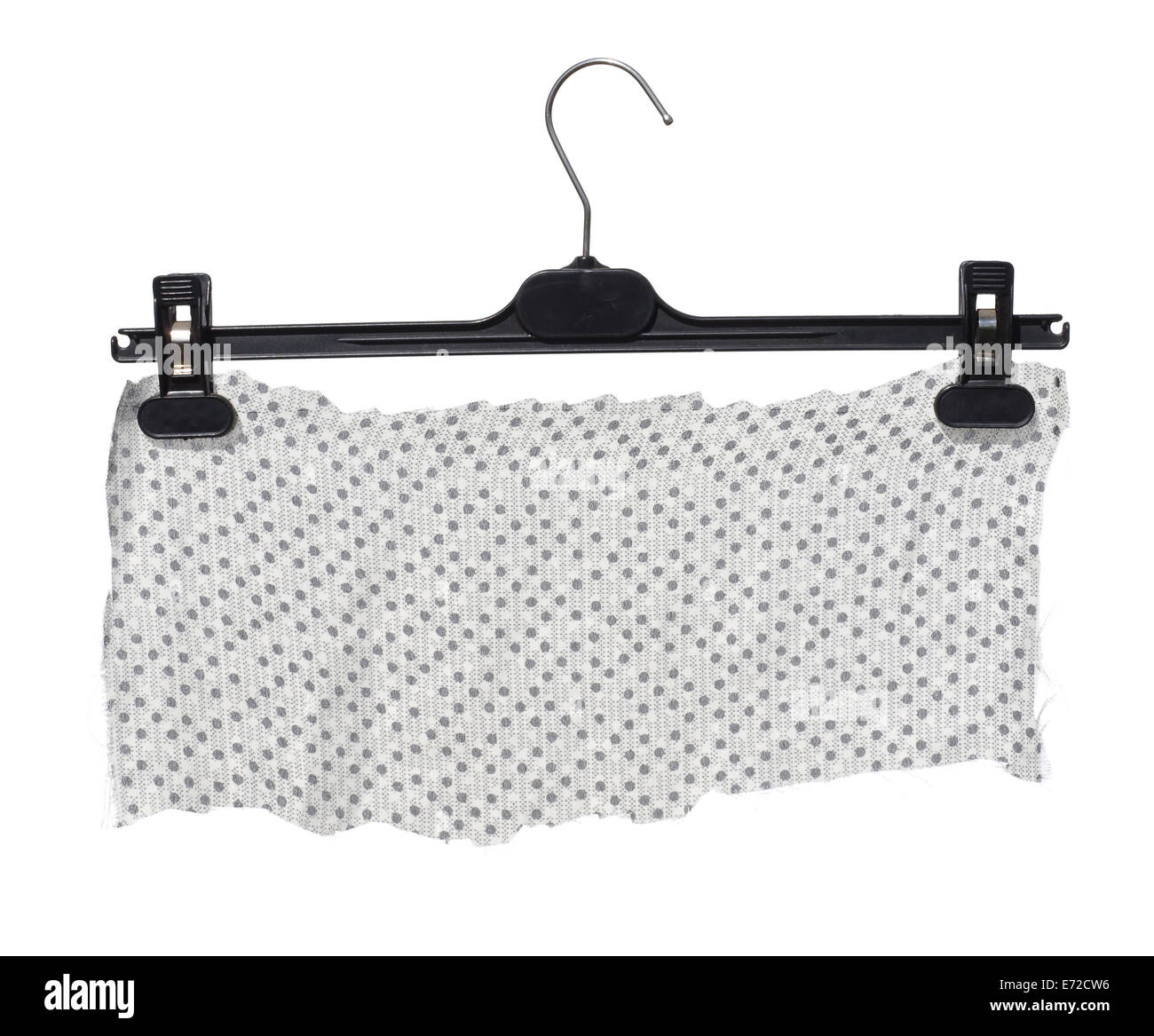 plastic clothes hanger with hanging on her cloth, isolated on white ...
