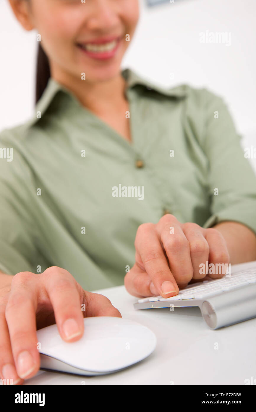 Hand click modern computer mouse and keyboard Stock Photo - Alamy