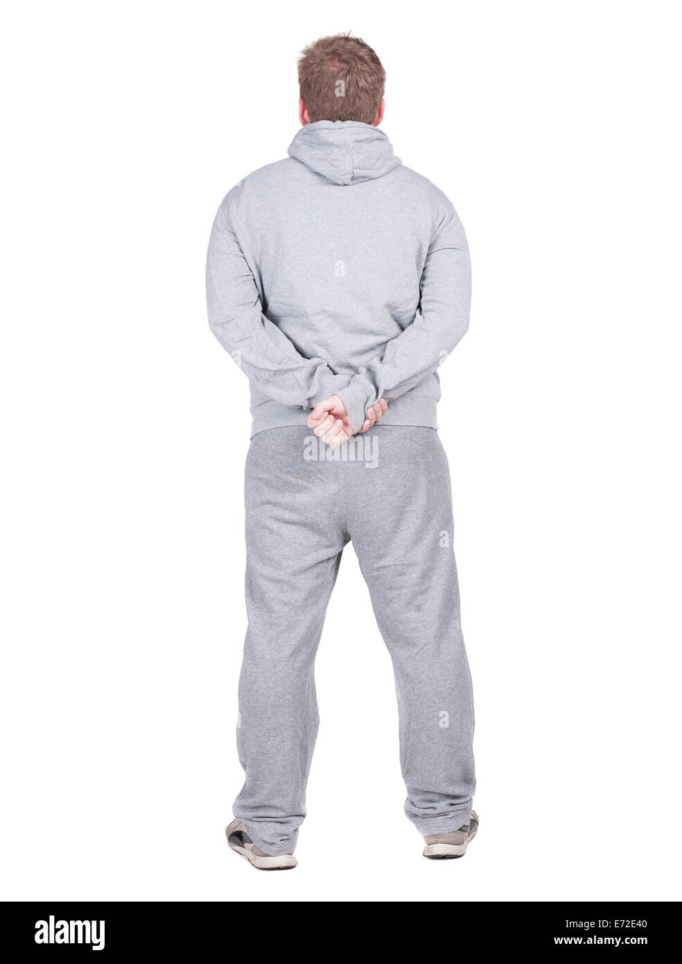 Back view of young men athlete Guy looks away. Rear view. Isolated over ...