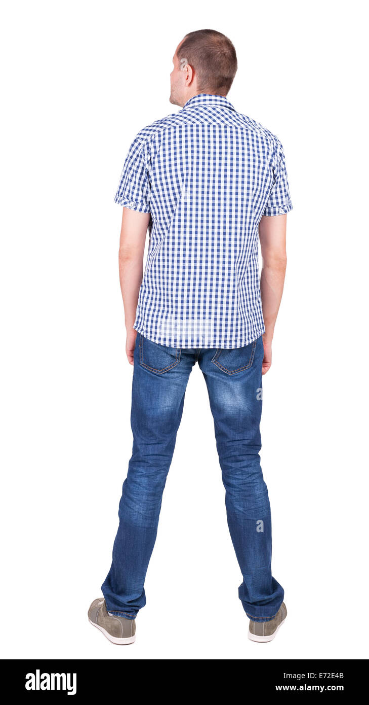 Back view of handsome man in shirt looking up. Standing young guy in ...