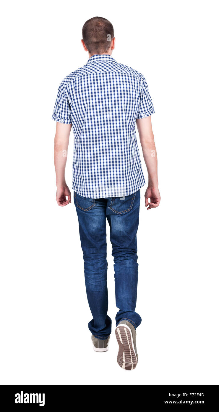 Back view of going handsome man in jeans and a shirt. walking young guy ...