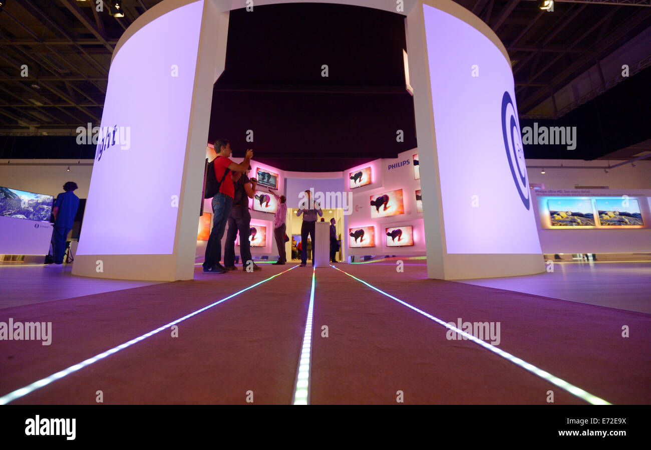Berlin, Germany. 04th Sep, 2014. People look at a TV installation at ...