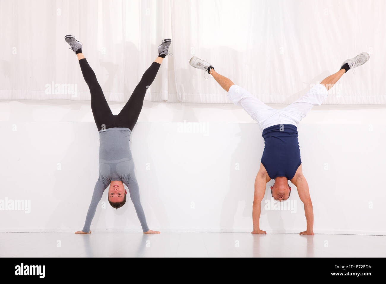 Handstand two hi-res stock photography and images - Alamy