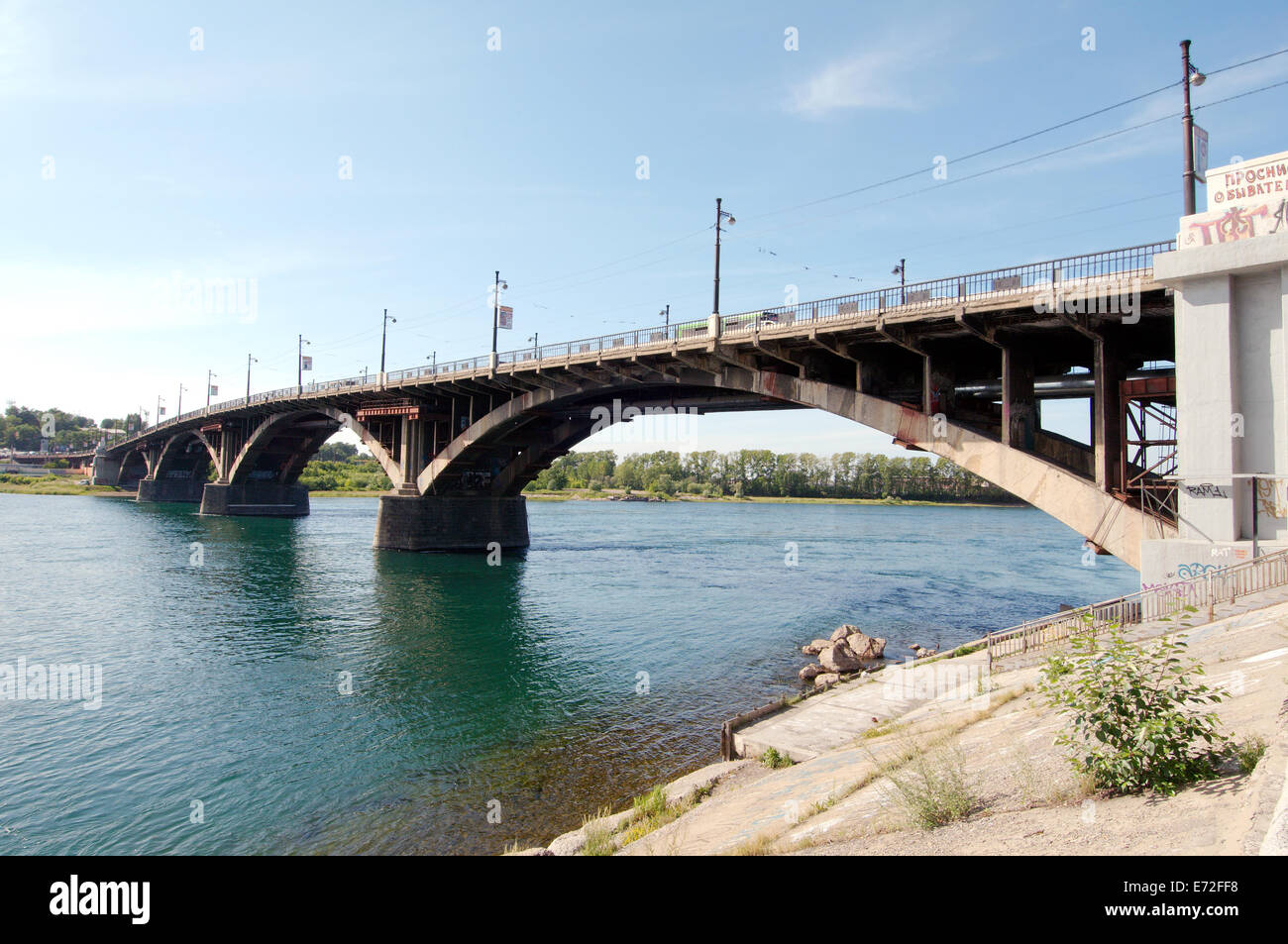 Bridge across the Irkut River in historic city center. Irkutsk, Siberia ...