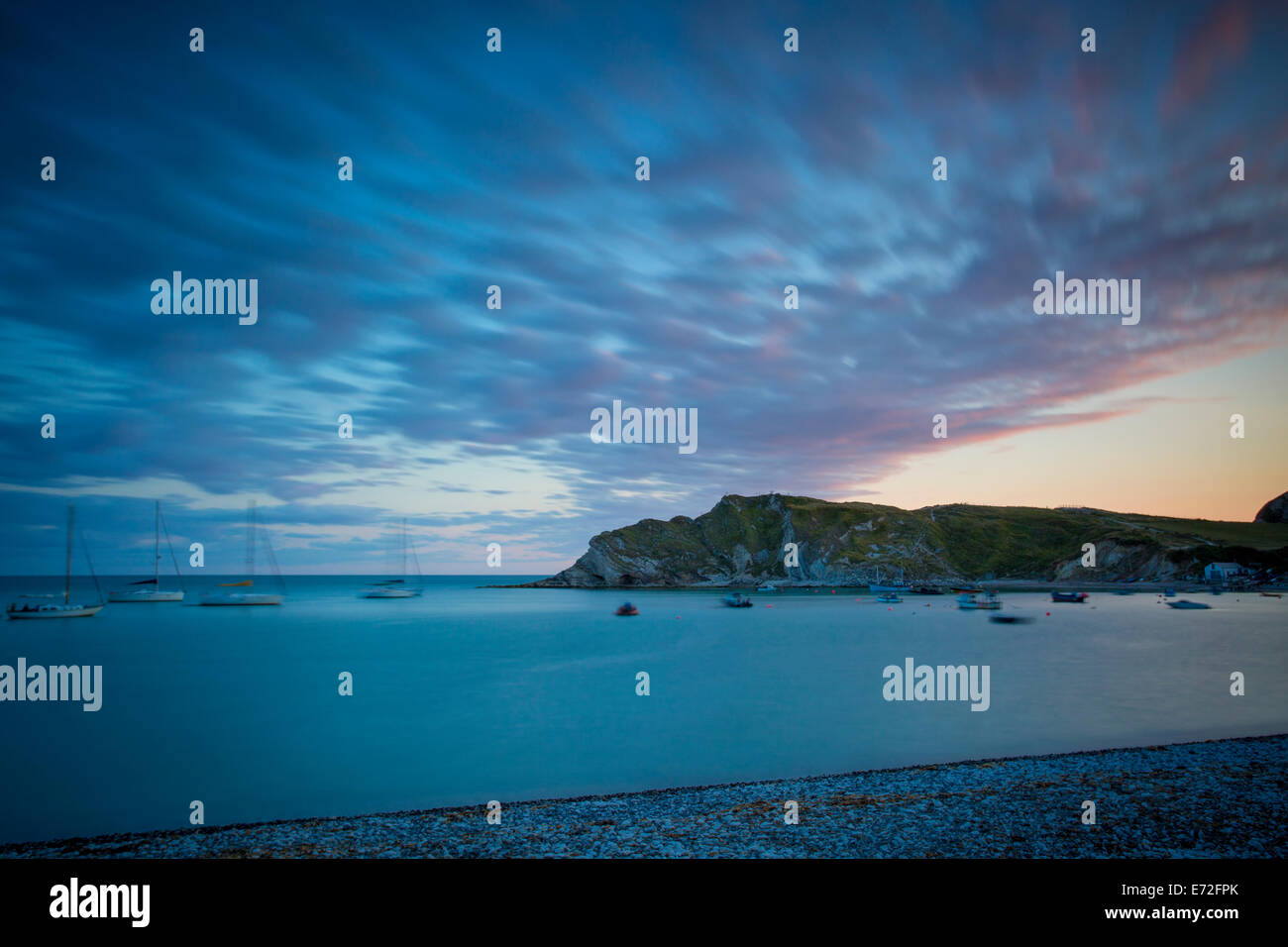 Twilight over Lulworth Cove along the Jurassic Coast, Dorset, England ...