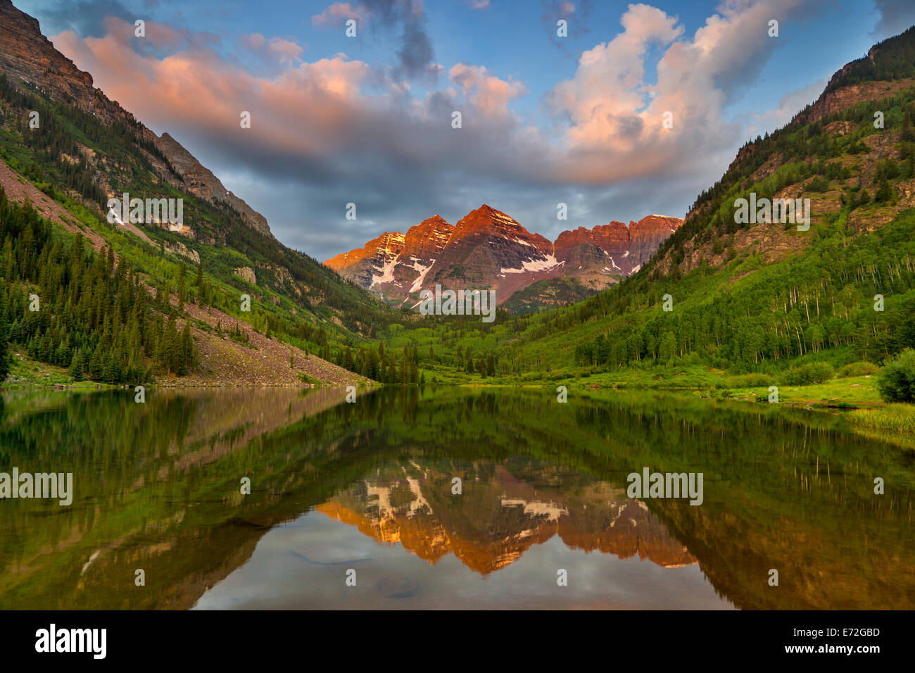 Maroon Bells reflect into calm Maroon Lake near Aspen, Colorado, USA ...