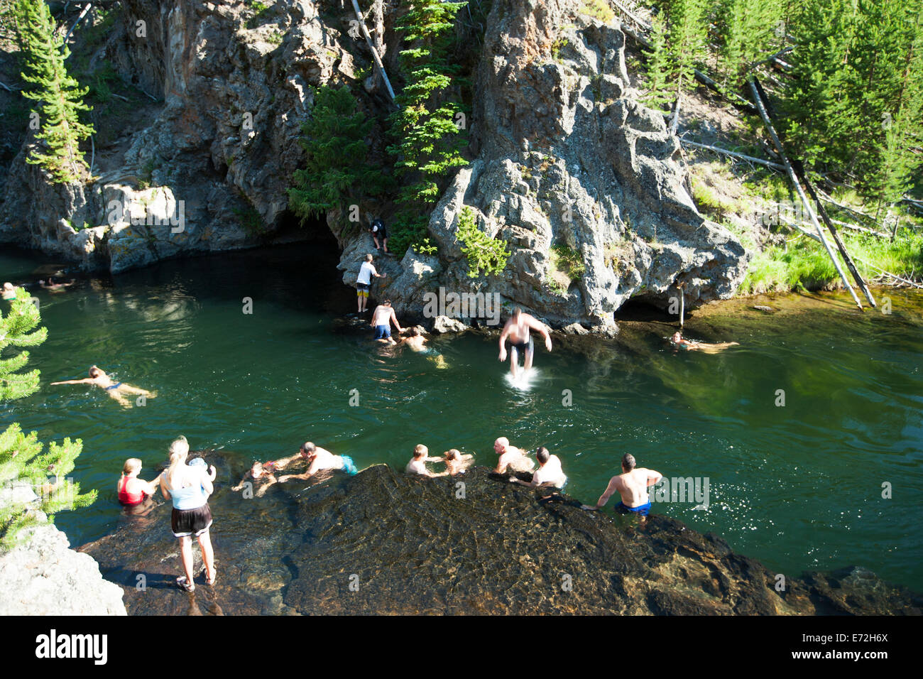 People Swimming In A River
