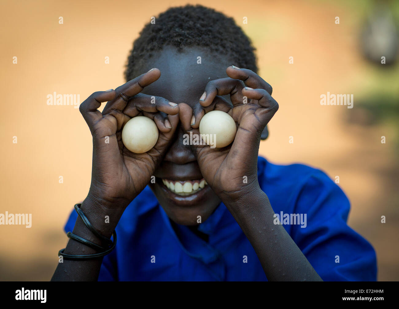 Anuak Tribe By Playing With Eggs, Gambela, Ethiopia Stock Photo - Alamy