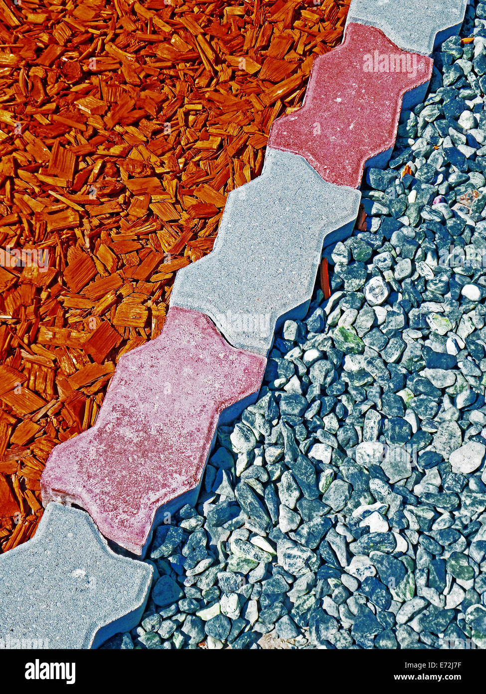 Paving garden ornaments with stone and wood chips colored Stock Photo ...