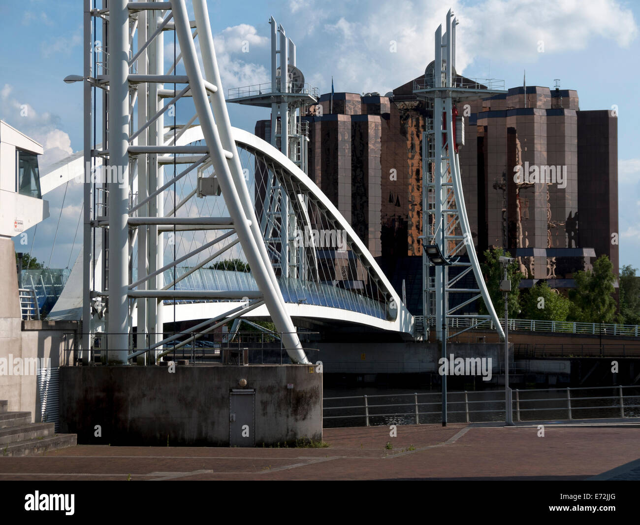 The Millennium footbridge and the Quay West building, Salford Quays ...