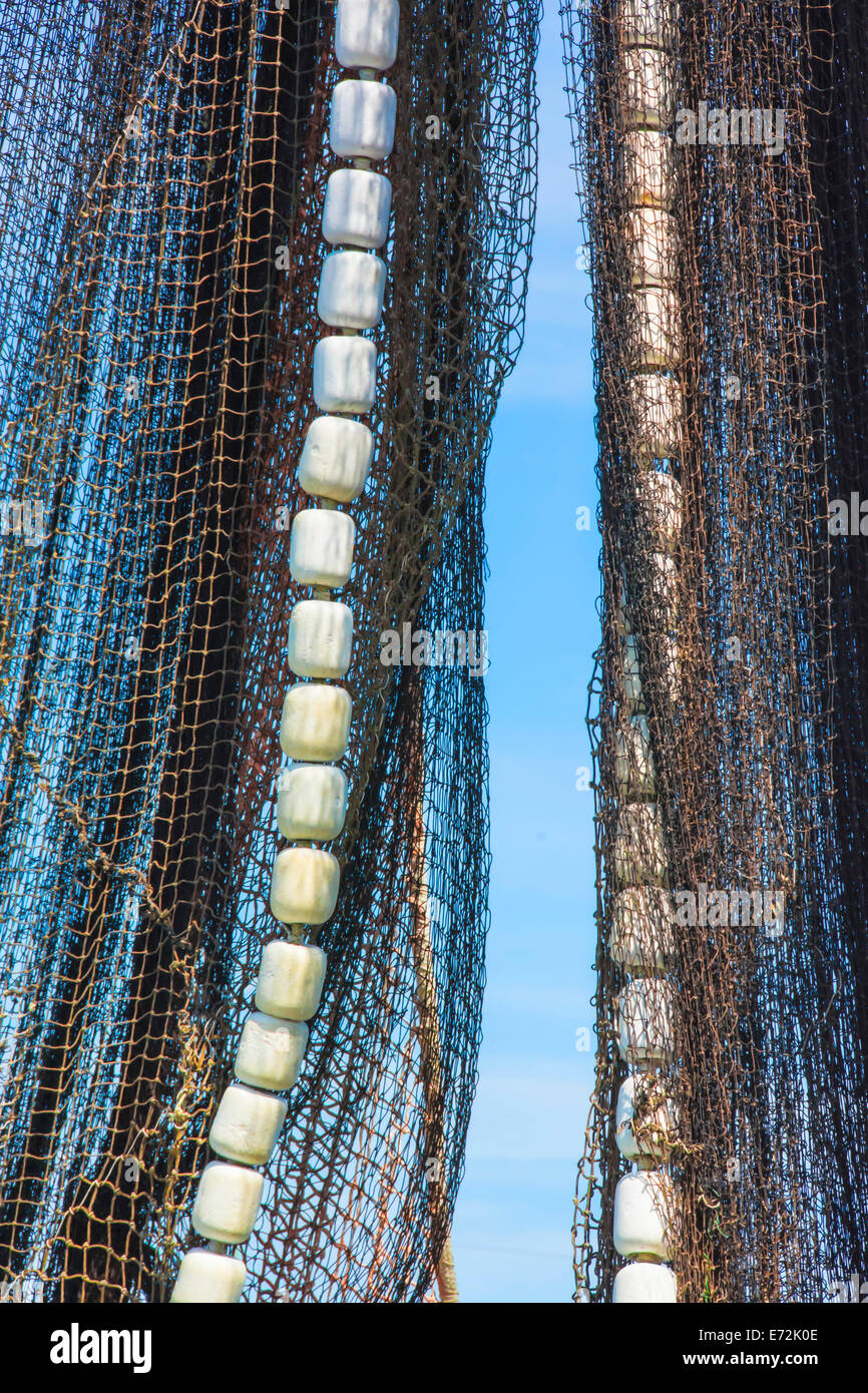 Nets with their floats hang drying on a fishing boat Stock Photo - Alamy