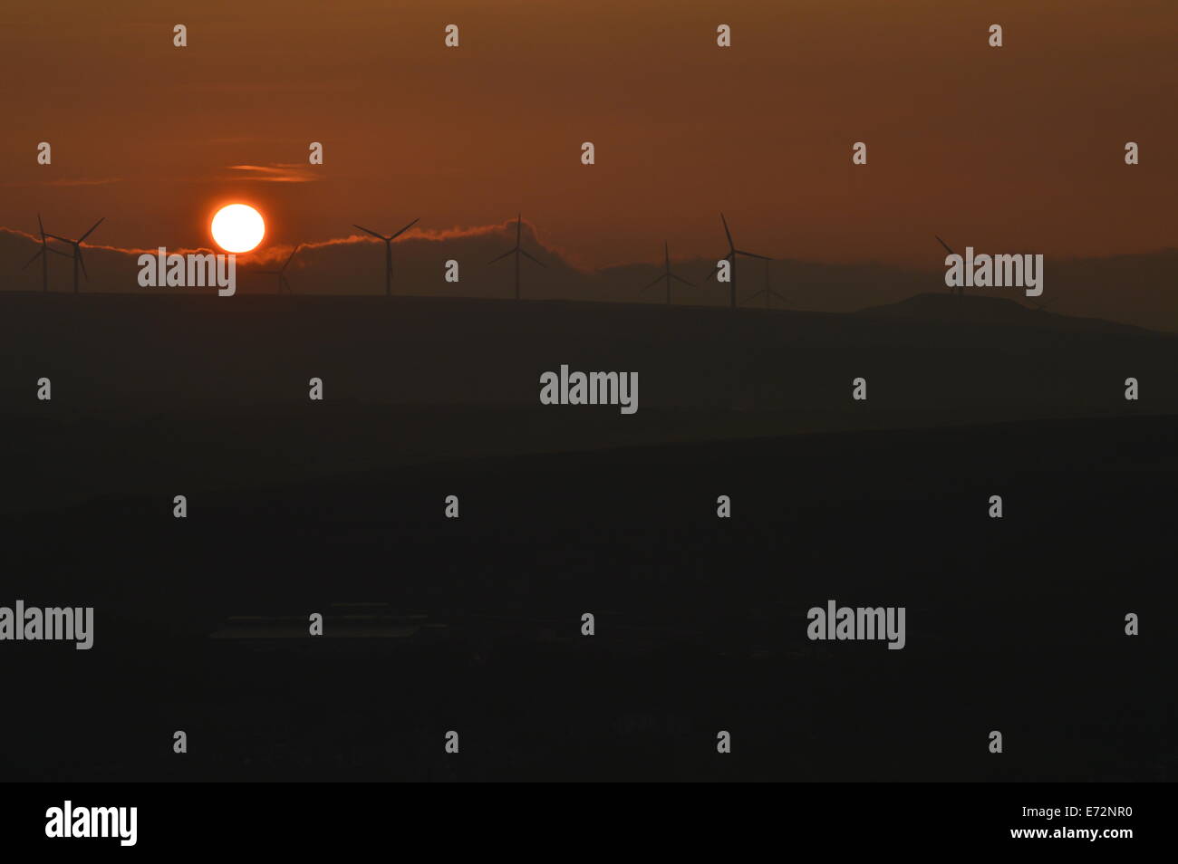sunrise and wind turbines Stock Photo - Alamy