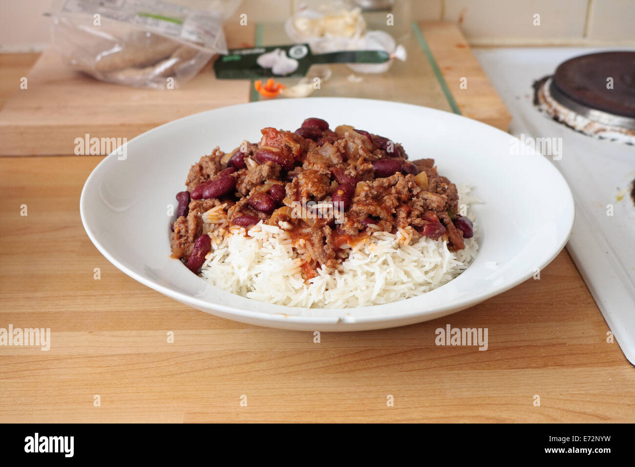 A bowl of home-made chilli con carne and rice Stock Photo - Alamy