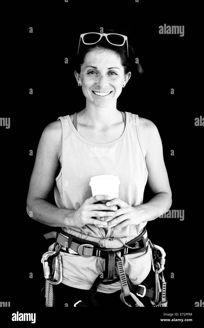 A female climber poses for a portrait after a day of climbing in Joshua ...