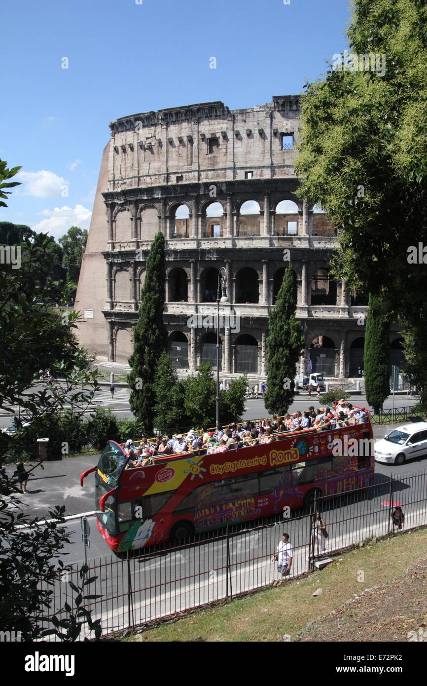 city tour bus by the colosseum in rome italy Stock Photo - Alamy
