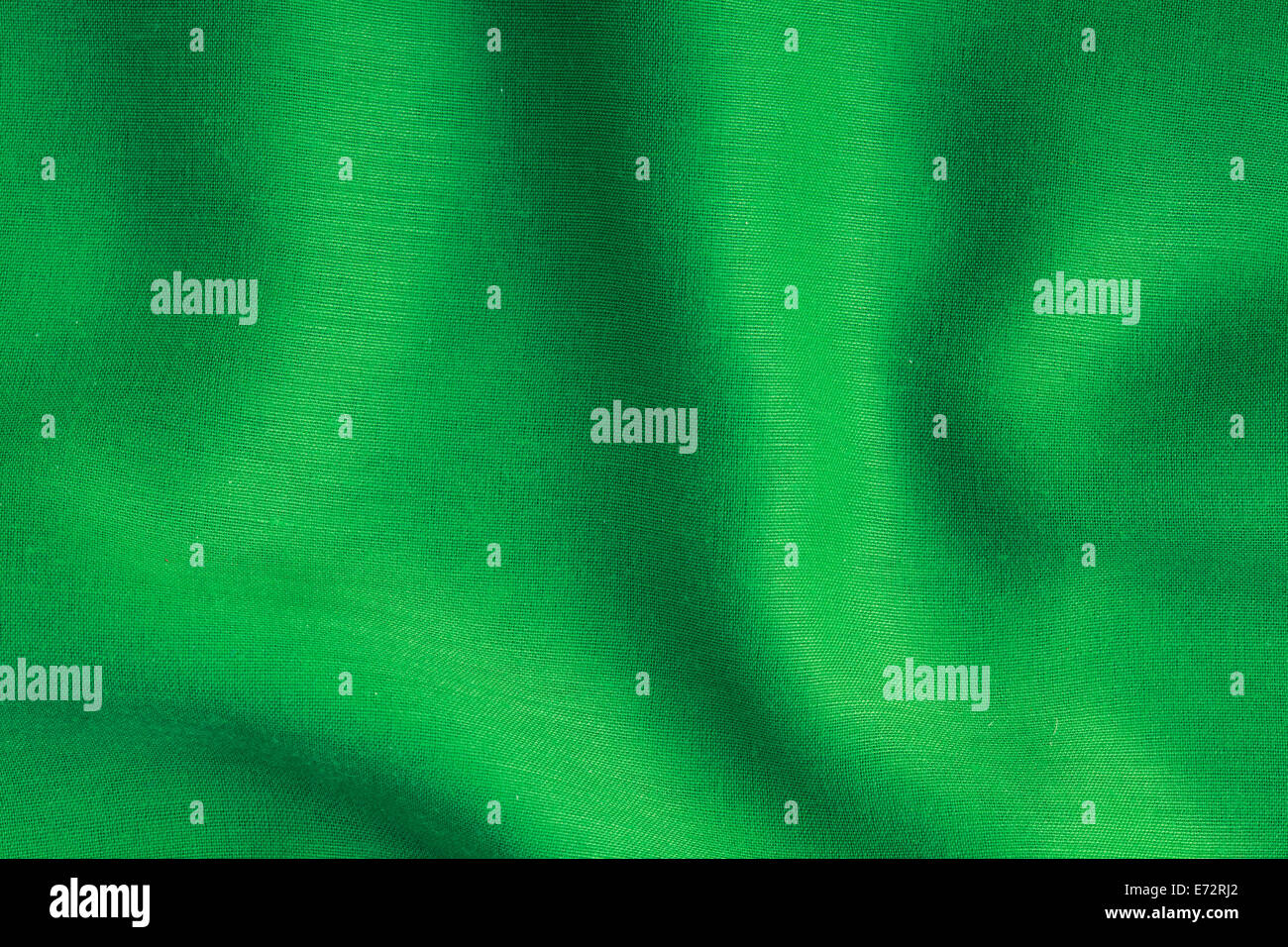 green background abstract cloth wavy folds of textile texture wallpaper ...