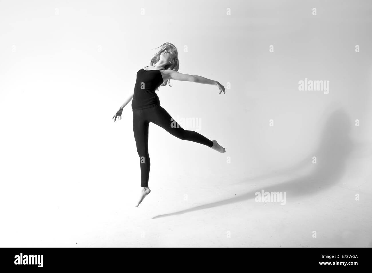 Woman dancing mid air hi-res stock photography and images - Alamy