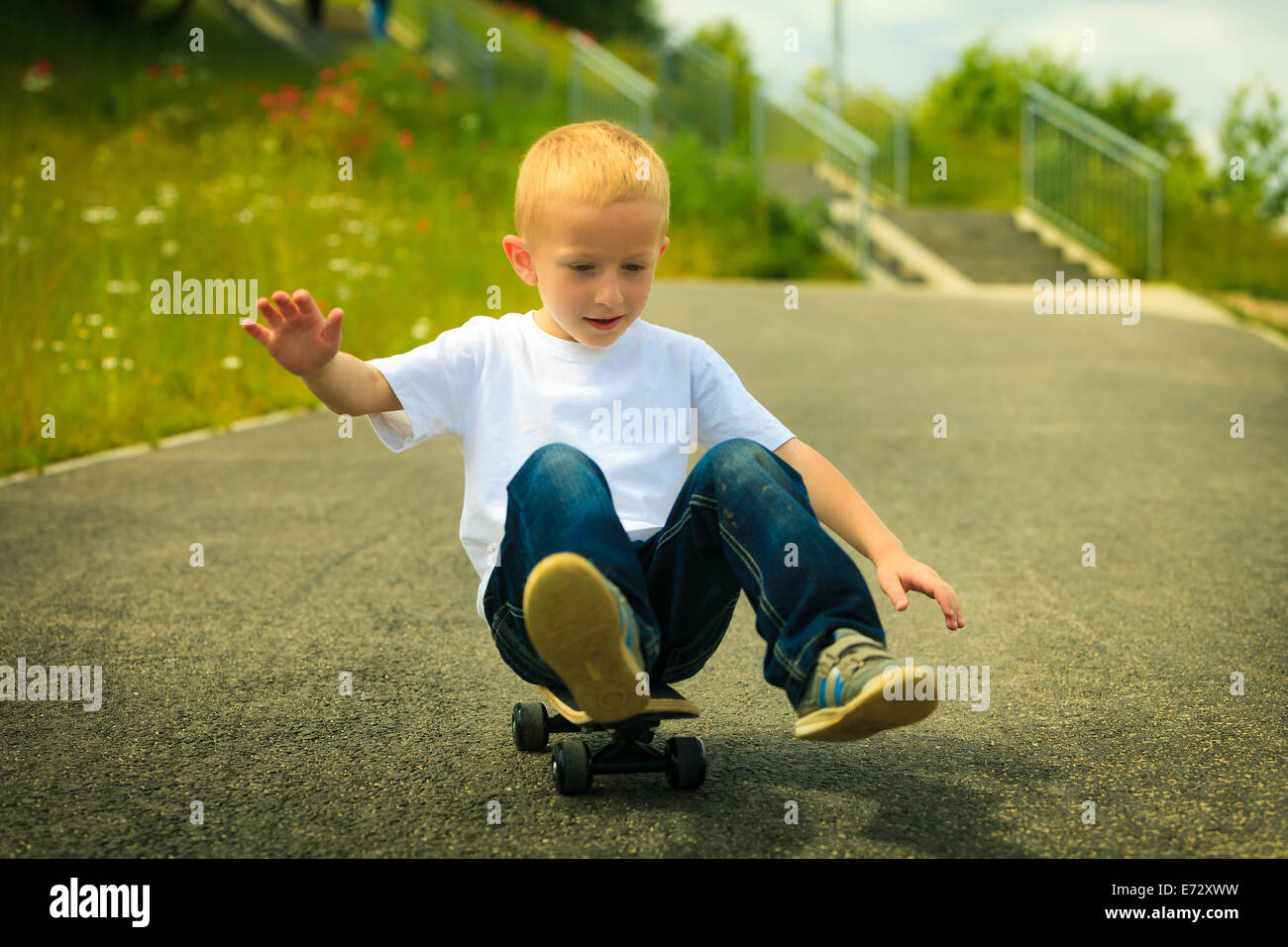 Skater boy with his skateboard Stock Photo - Alamy