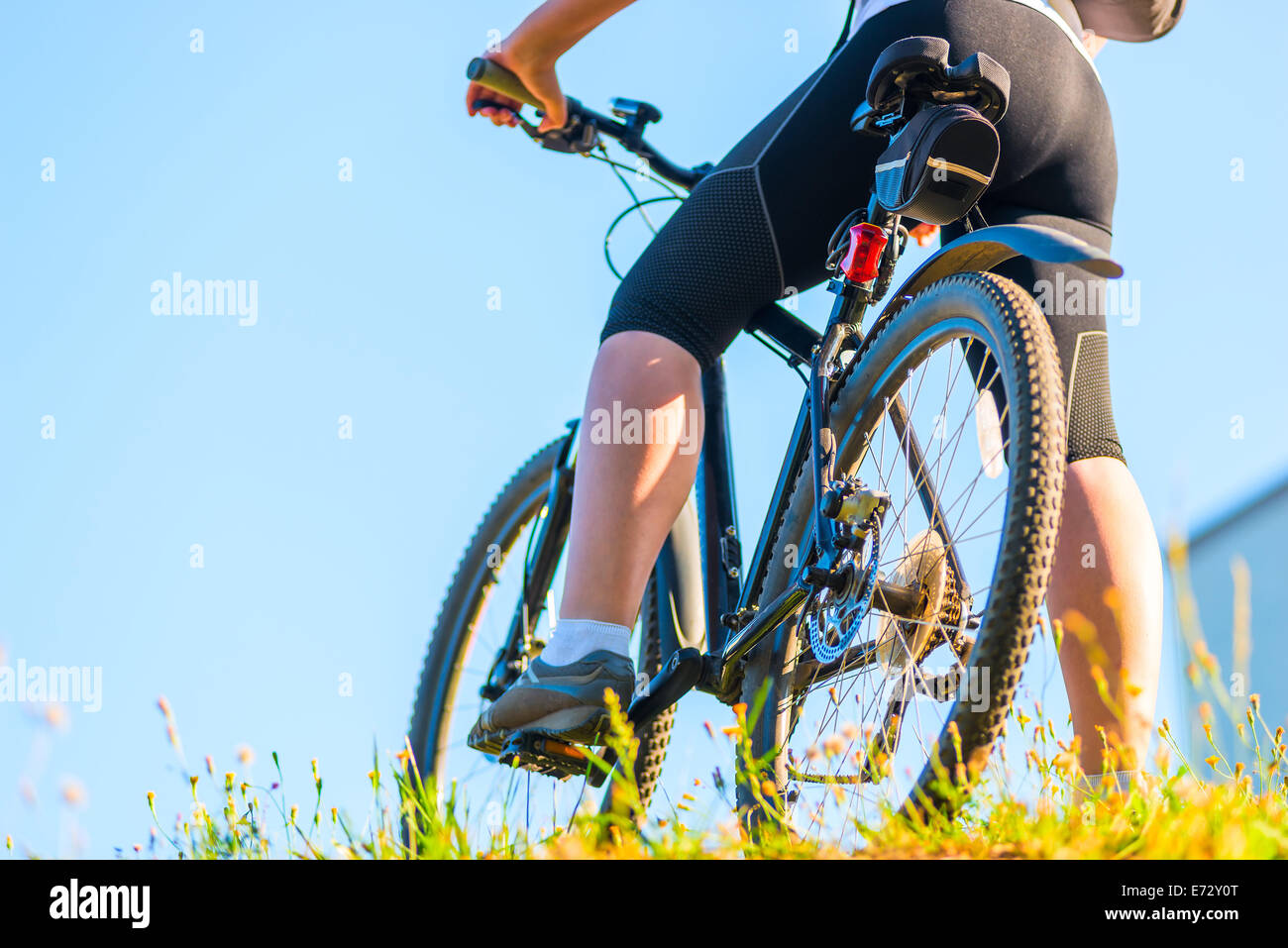Bike and foot athlete closeup Stock Photo - Alamy